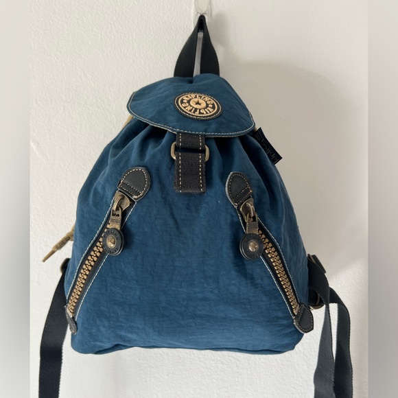 Kipling | Bags | Kipling Vintage 9s Fundamental Cinch Mini Backpack In ...